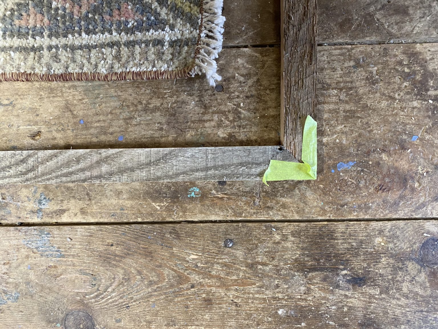 How To Make A DIY Framed Vintage Rug for under $100 - The Wild Decoelis