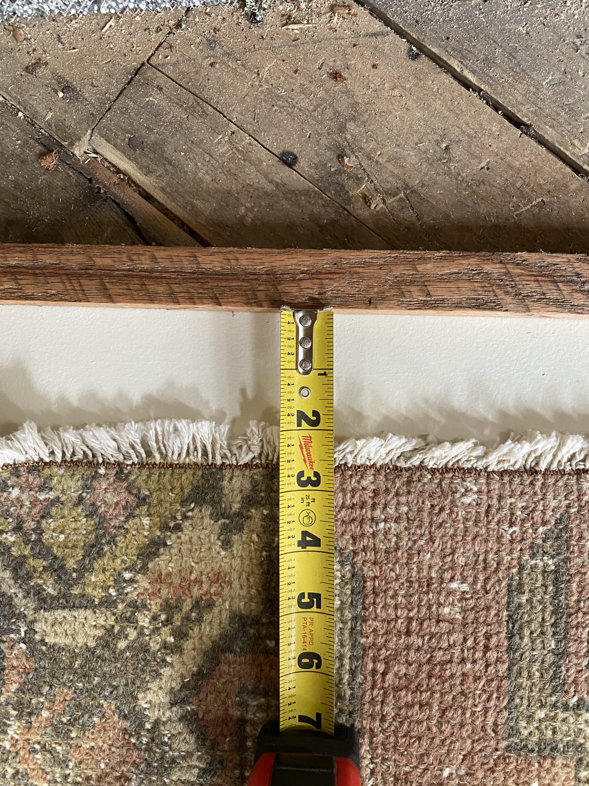 How To Make A DIY Framed Vintage Rug for under $100 - The Wild Decoelis